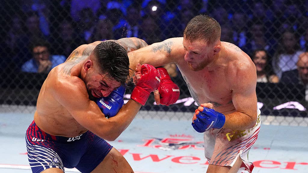 Justin Gaethje Stuns Ilia Topuria to Win UFC Lightweight Title - Men's ...