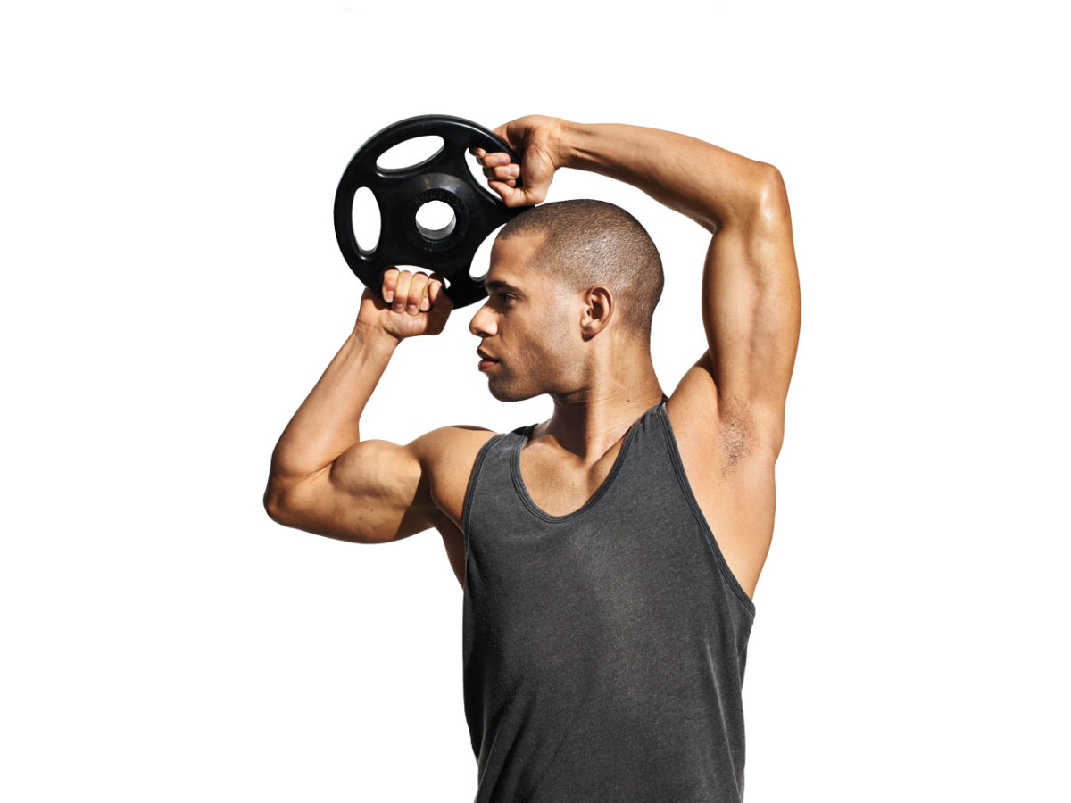 The surprisingly difficult 45 pound plate workout Men s Fitness