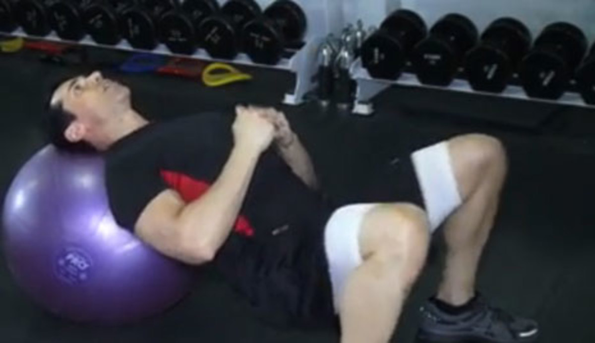 Exercise to Know: Swiss Ball Neck Bridge - Men's Fitness