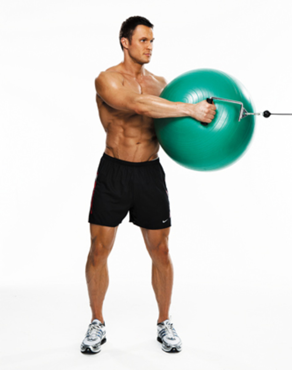 Swiss-Ball Cable Rotation - Men's Fitness