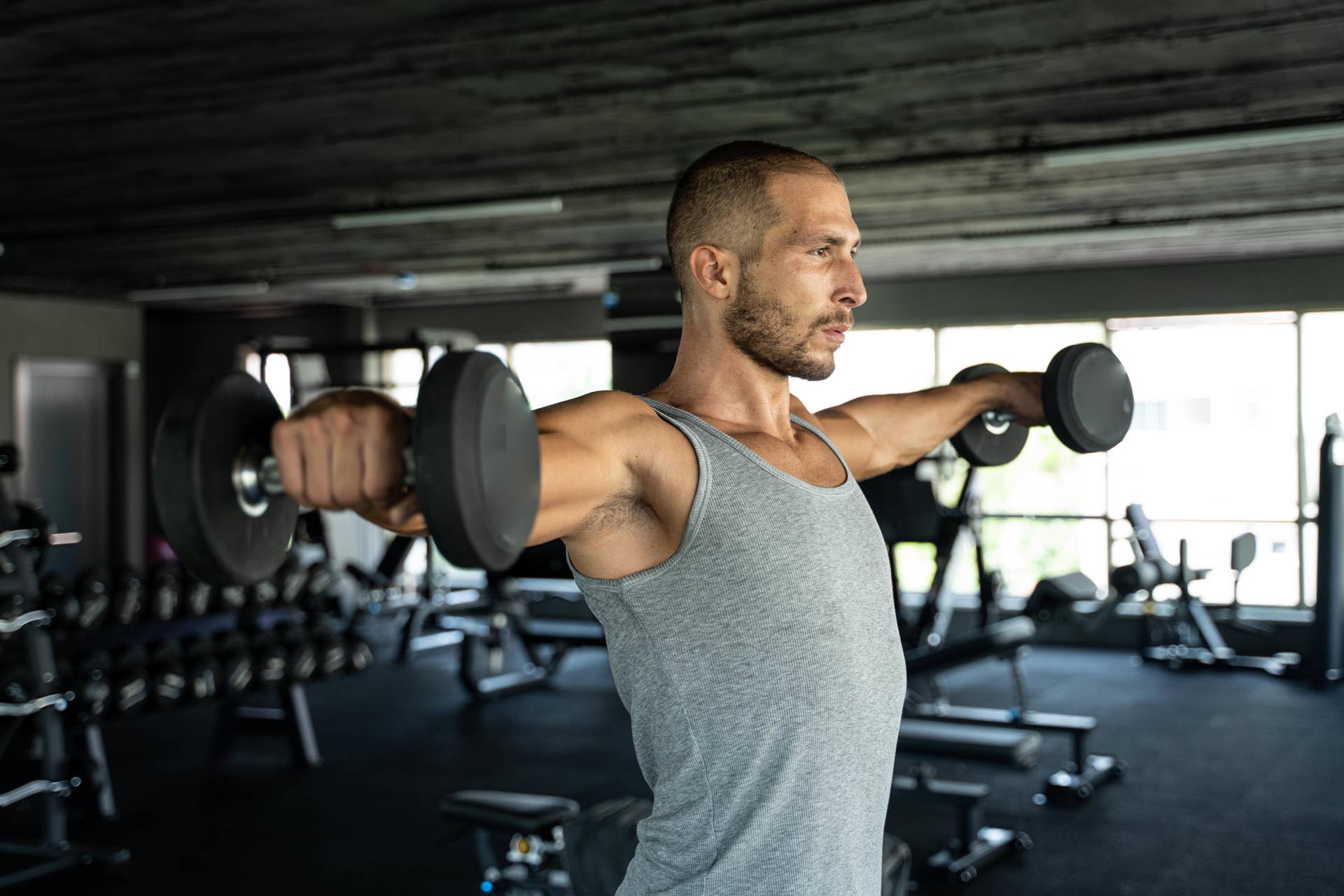 Maximize Shoulder Gains with a Dumbbell Shoulder Workout - Men's Fitness