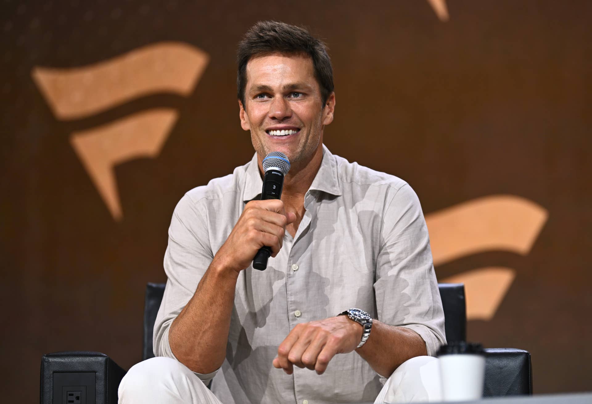 Tom Brady Shocks Fans in a Raiders Jacket - Men's Fitness