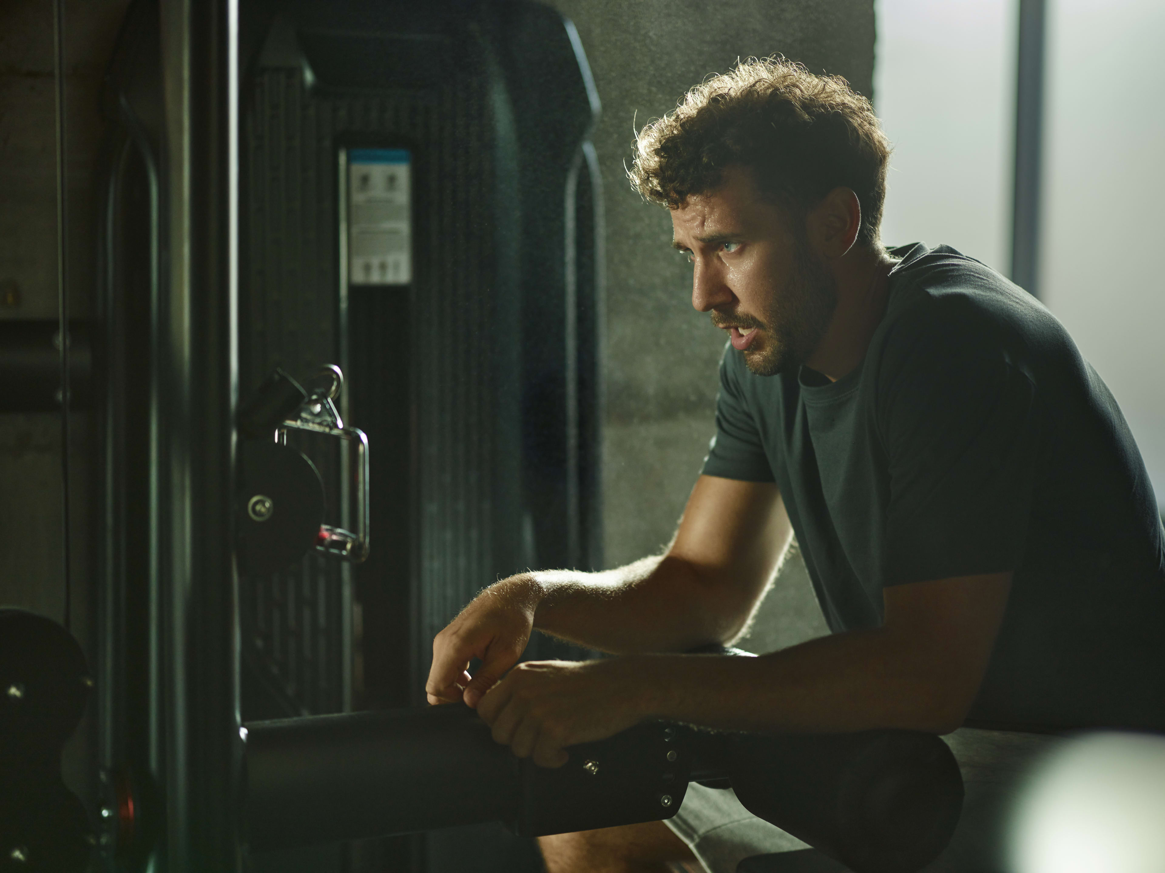 Build Bigger Traps With the Calf Raise Machine for Shrugs - Men's Fitness