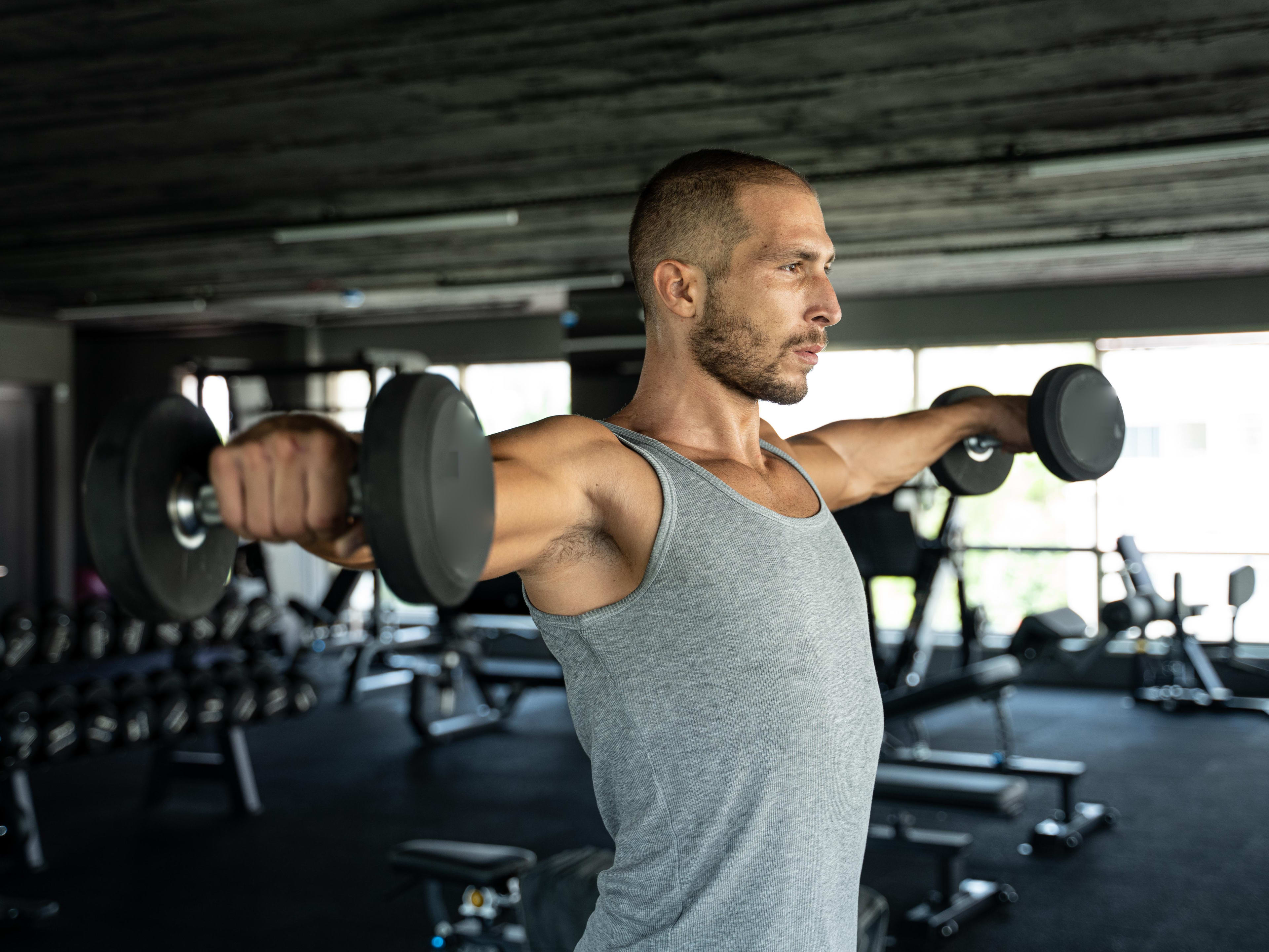 Maximize Shoulder Gains with a Dumbbell Shoulder Workout - Men's Fitness