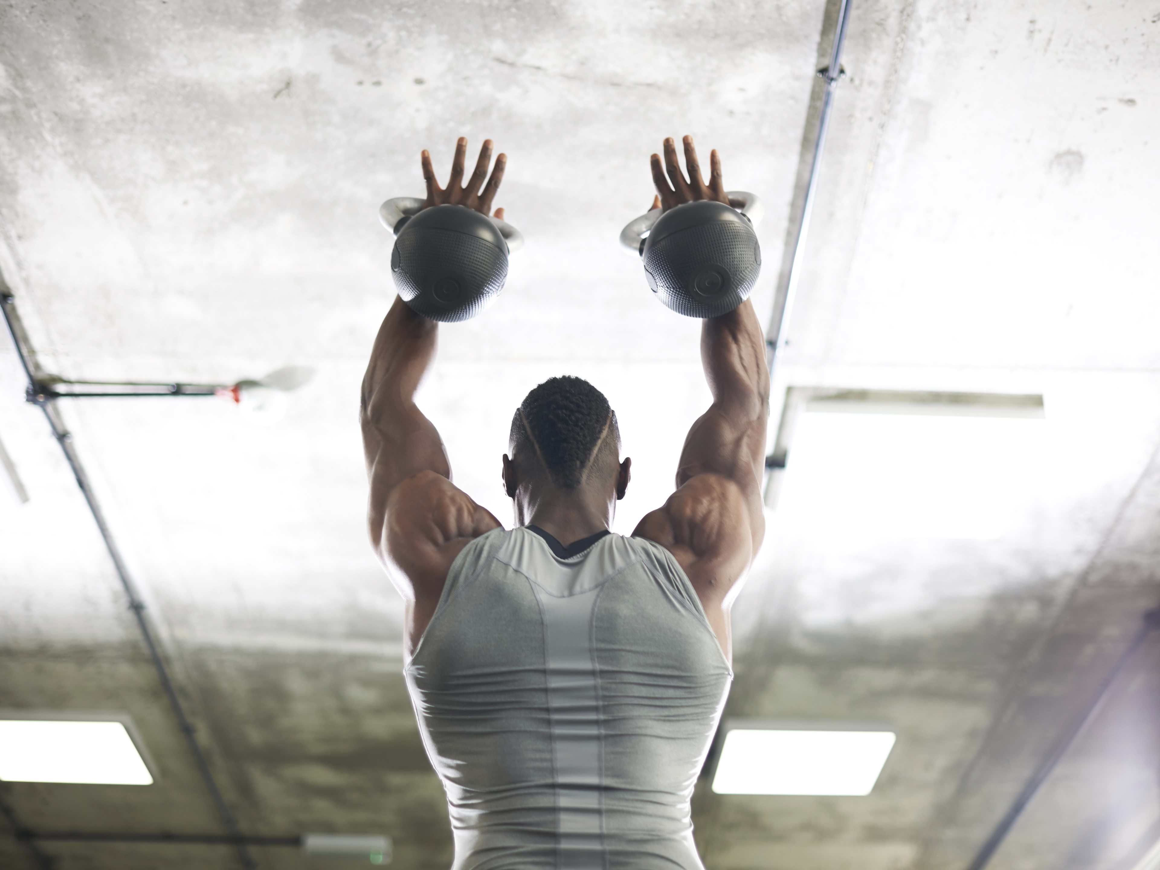 The 10 Best Kettlebell Workouts Will Build Bigger Arms, According to ...