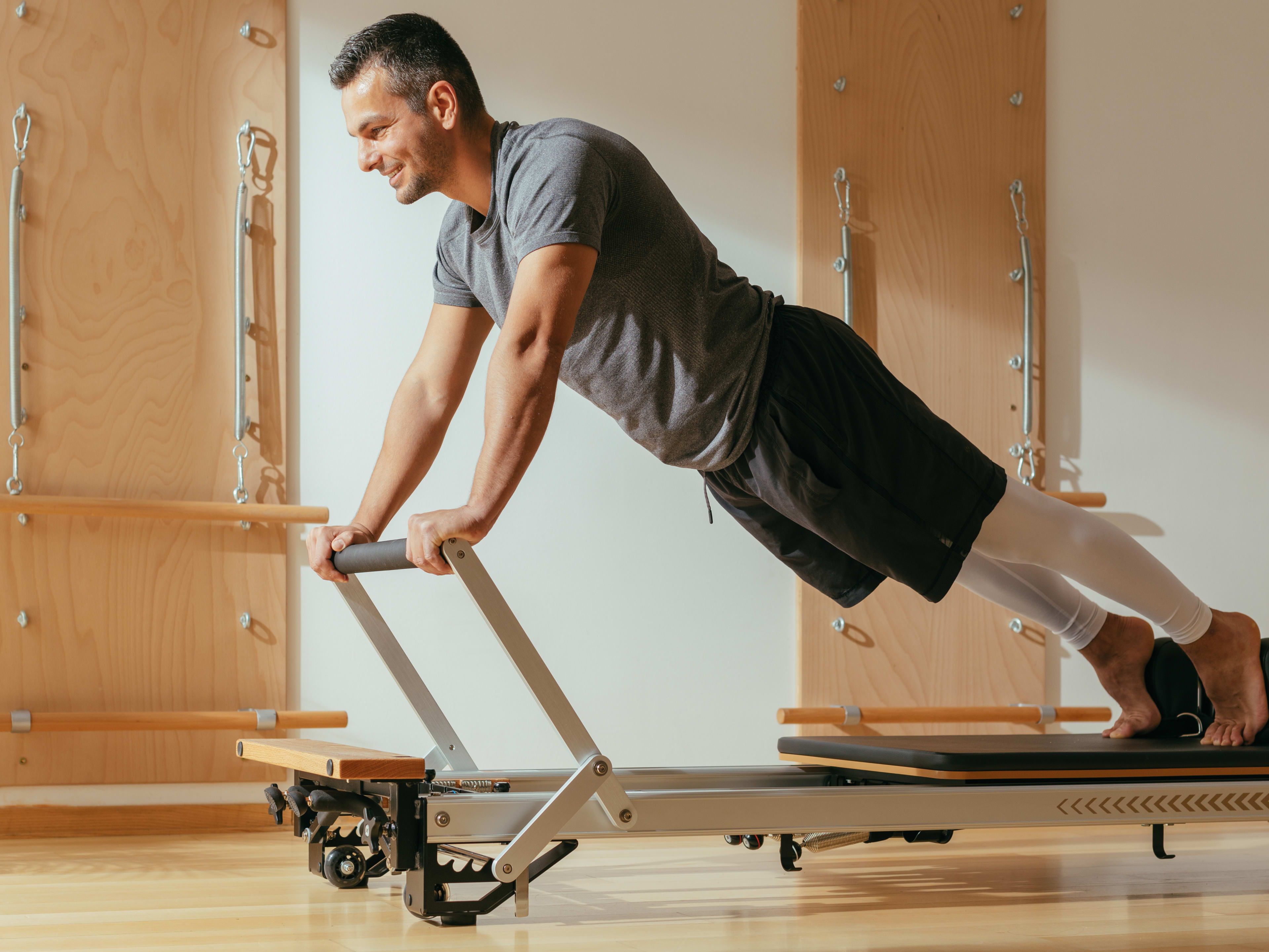 How Pilates Benefits Men, According to Experts - Men's Fitness