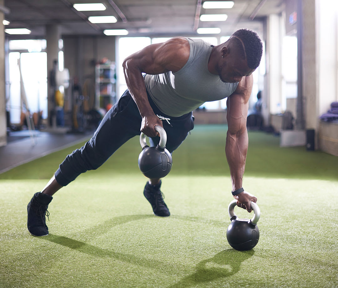 The 10 Best Kettlebell Workouts Will Build Bigger Arms, According to ...