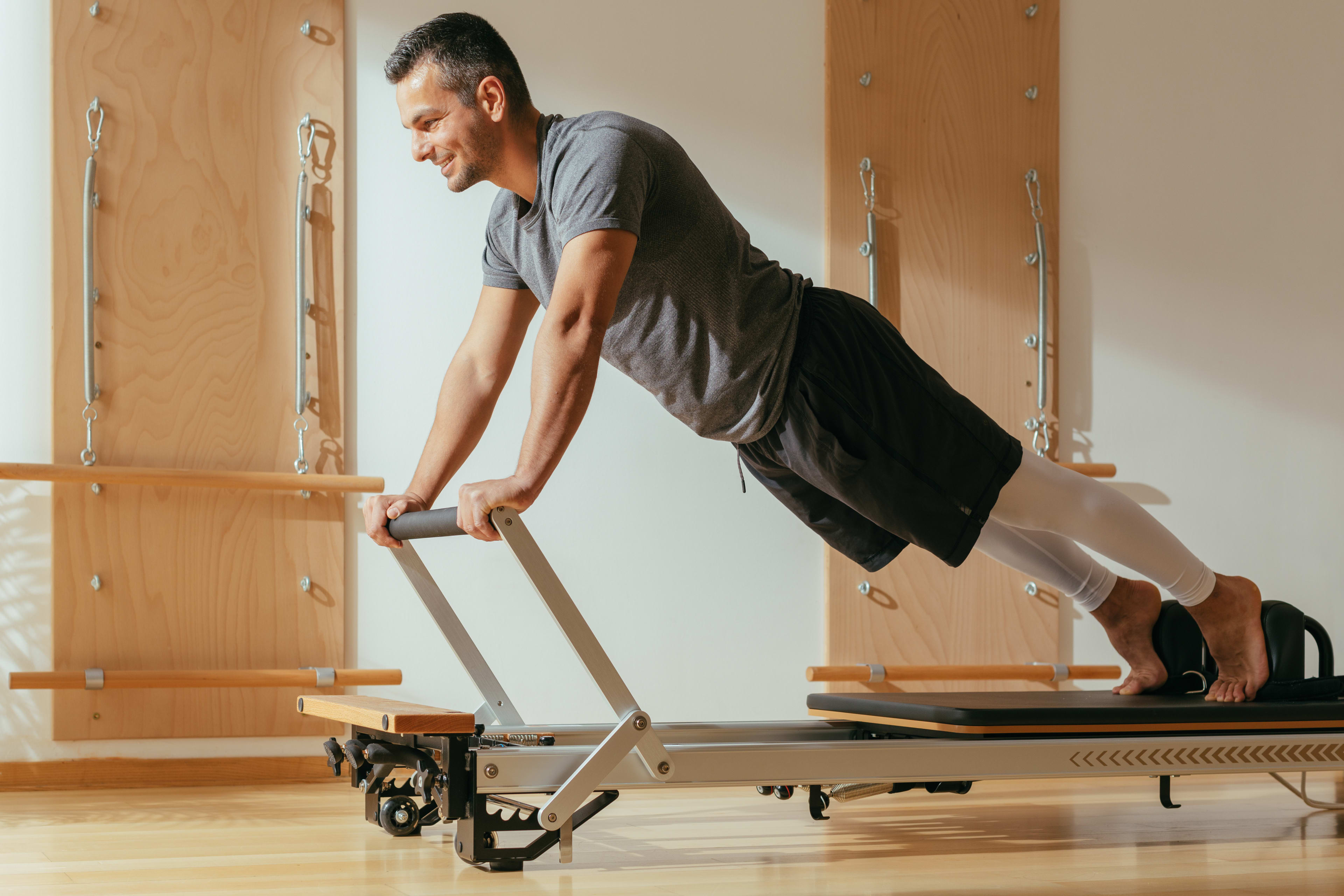 How Pilates Benefits Men, According to Experts - Men's Fitness